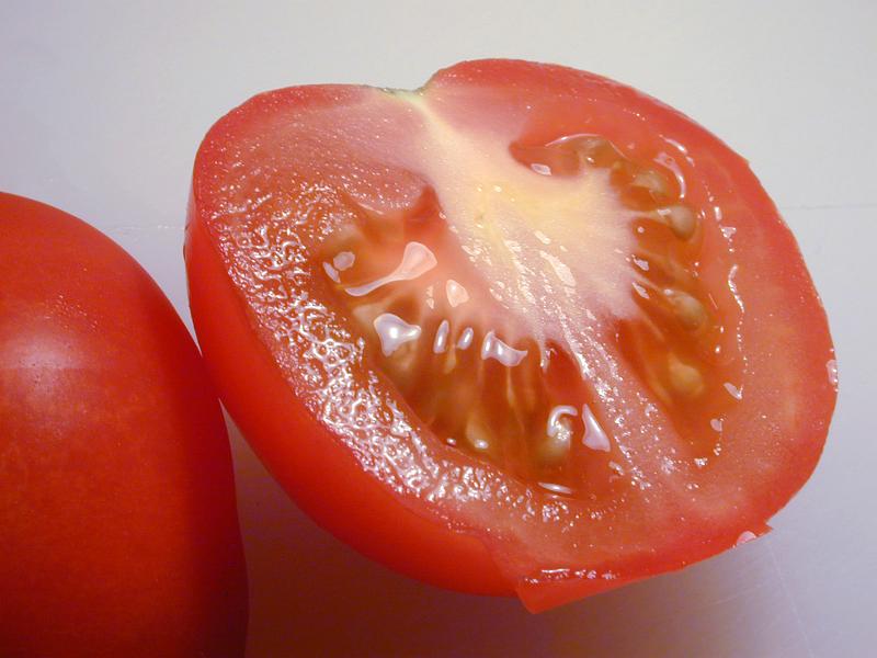 Free image of Halved ripe fresh juicy tomato