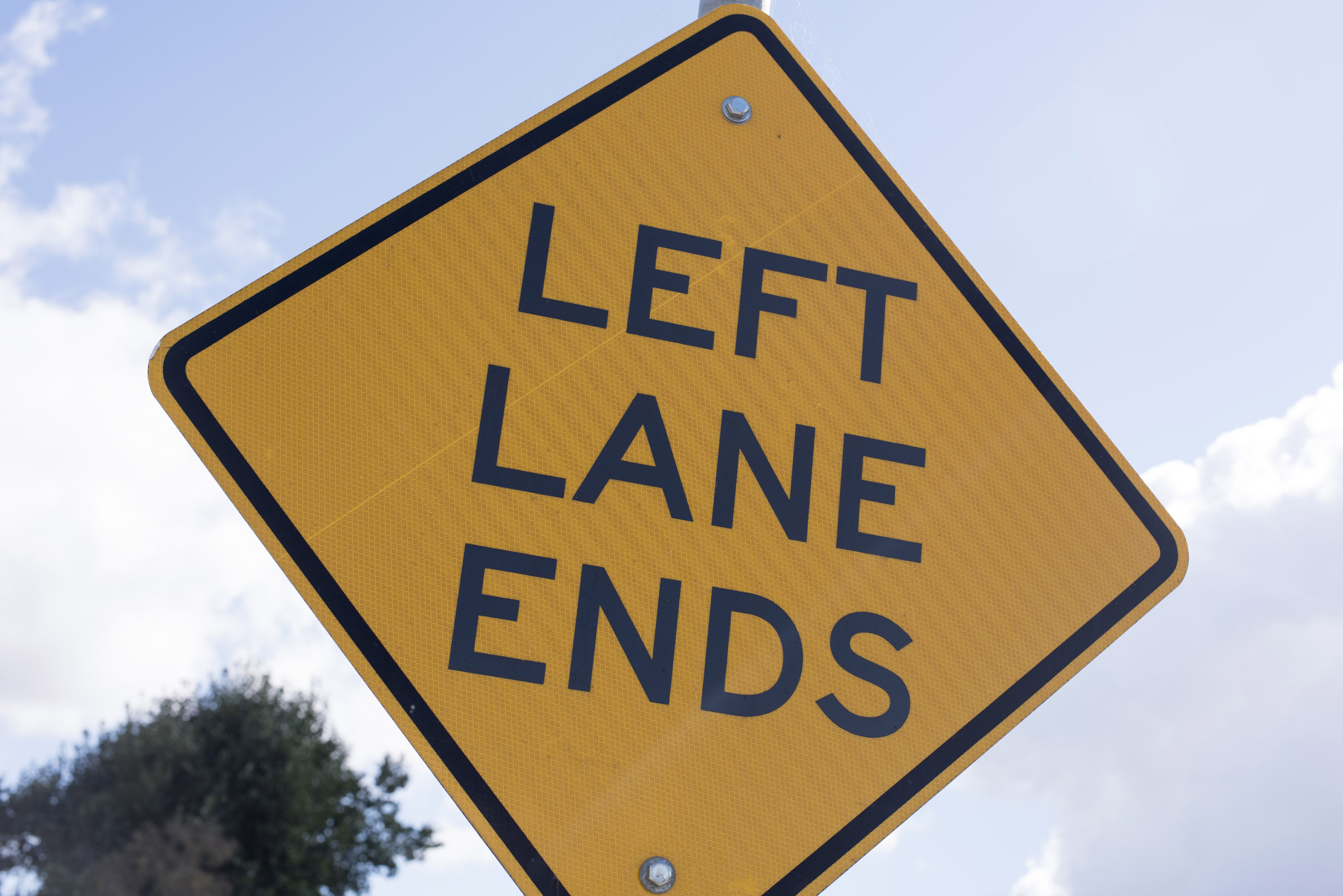 Lane Ends Sign