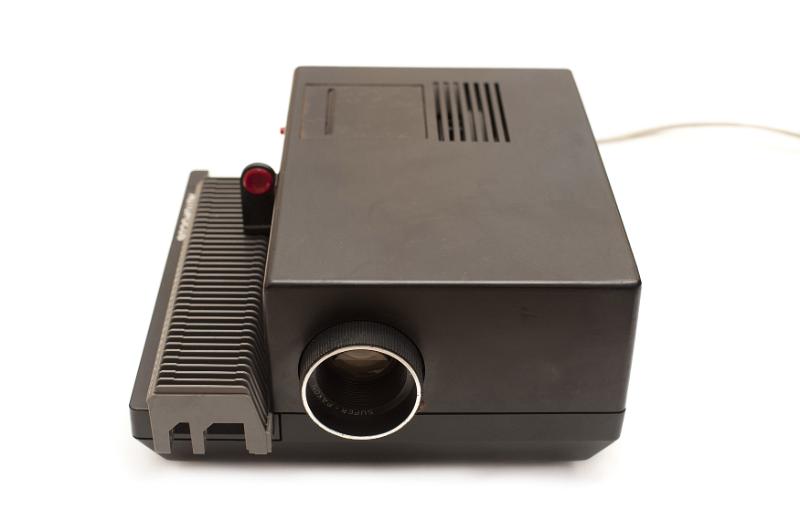 Free image of Old slide projector with tray at the side