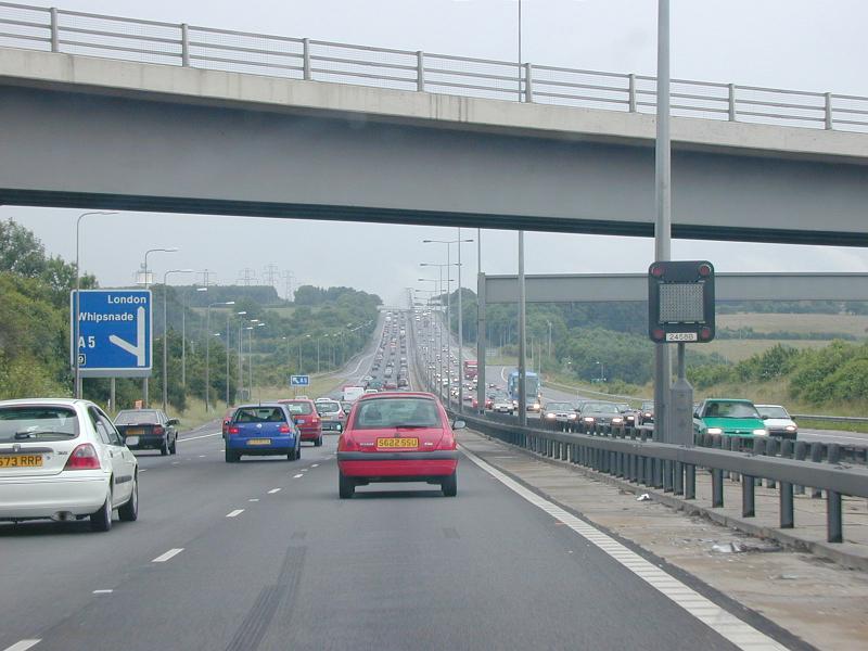Free image of Cars driving along a motorway